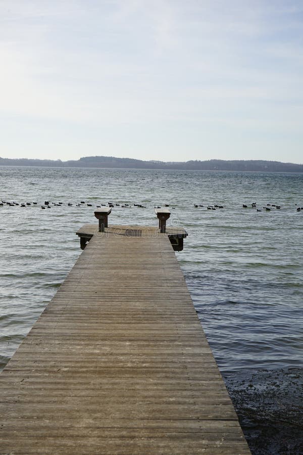 A dock on a lake stock image. Image of lake, bridge - 279057967