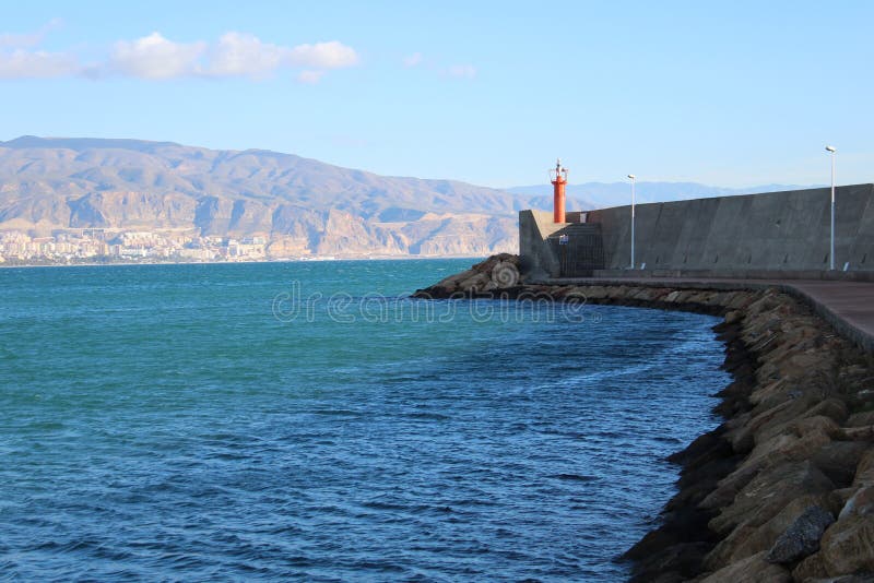 Dock with lighthouse stock image. Image of safety, light - 132951291
