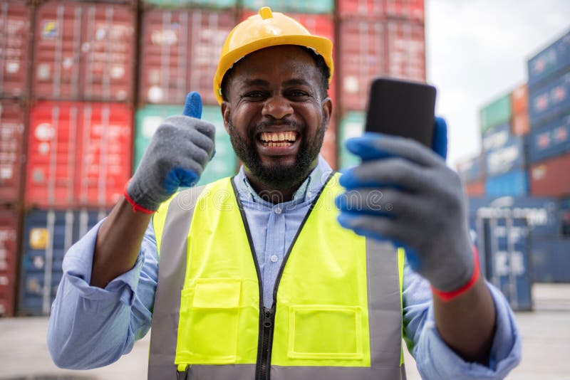Dock Manager or Engineer Worker in Safety Vest Standing in Shipping ...