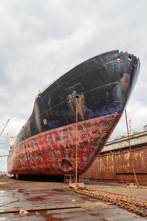 Dock with the Repair Ship in it Stock Image - Image of slip, deck ...