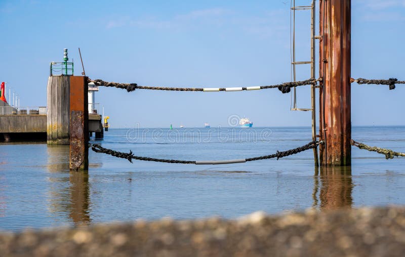 Dock, Secured with Thick Ropes and a Tall Pole Stock Image - Image of ...