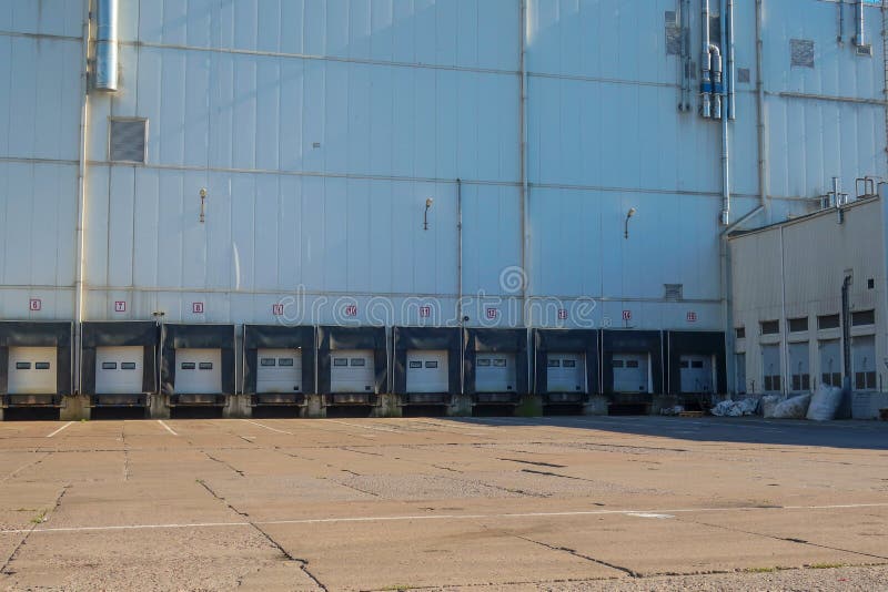 Gates for Unloading Trucks in the Warehouse Stock Photo - Image of city ...