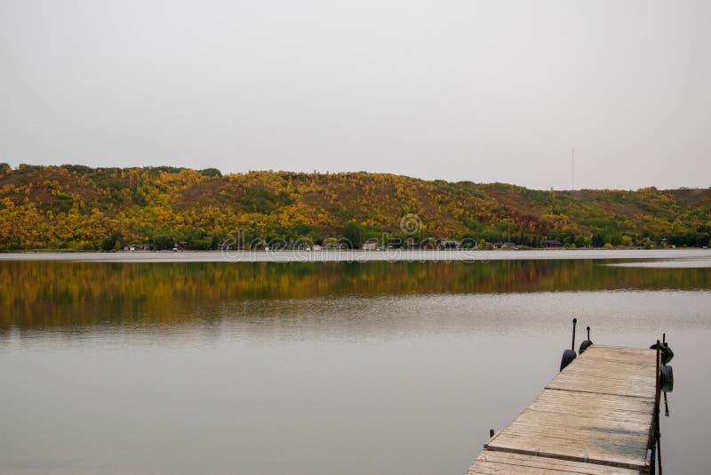 Dock in Still Waters in a River Valley Stock Image - Image of river ...