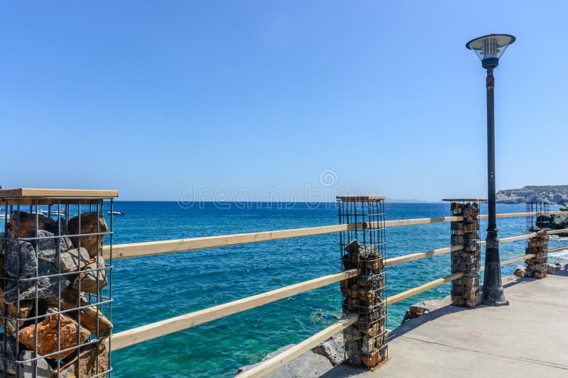 Dock with stone columns stock image. Image of harbor - 277931671