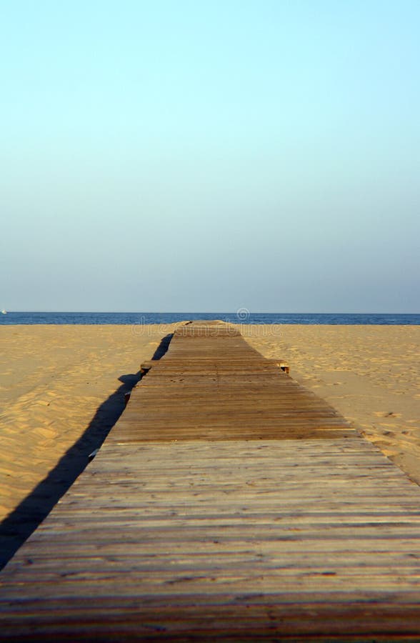 Dock to beach stock image. Image of boardwalk, beach, dock - 9290623