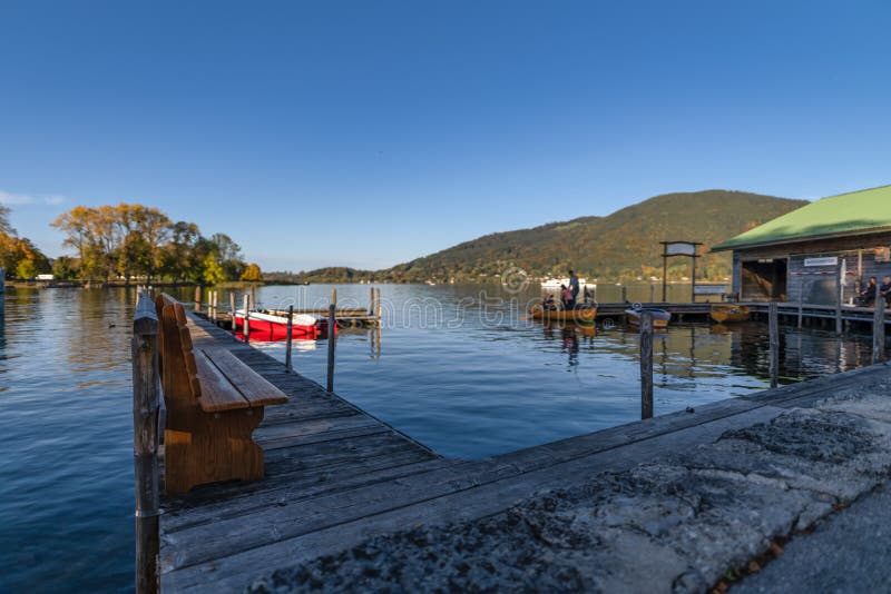A Dock To a Lake with Mountains in Background at Autumn. Stock Photo ...