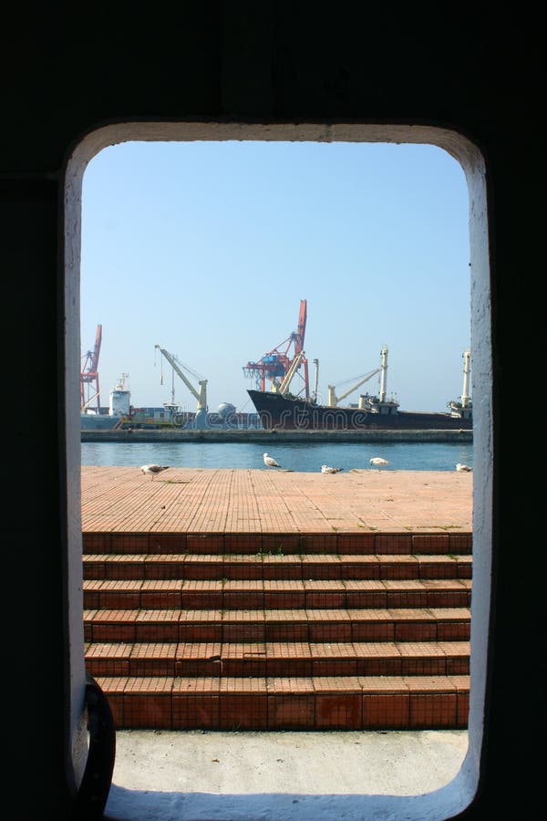 Dock View from Another Ships Window. Stock Image - Image of blue, pier ...