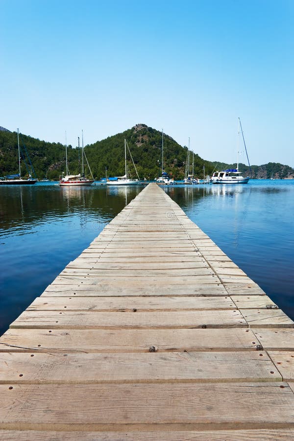 Dock in the water stock image. Image of mountain, sails - 10817969