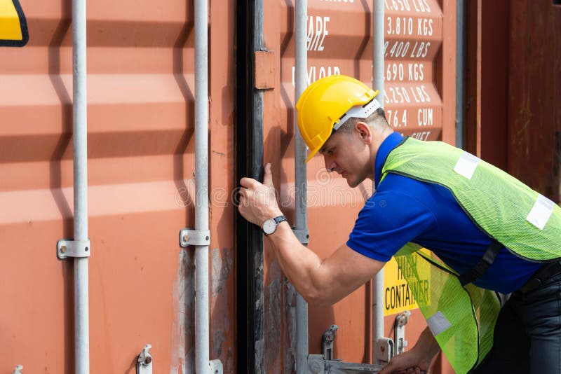 Dock Worker Man Working and Opening Containers Checking Goods at ...