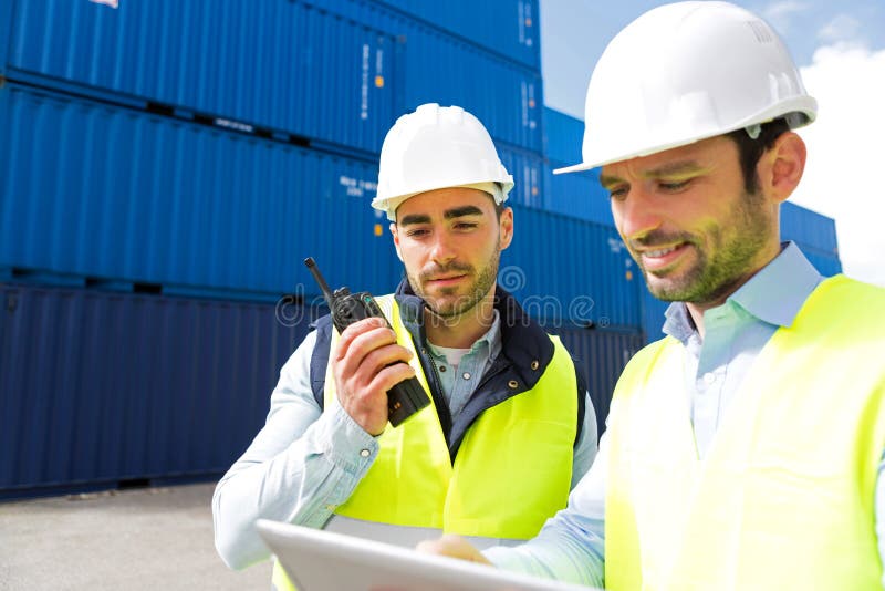 Dock Worker and Supervisor Checking Containers Data on Tablet Stock ...