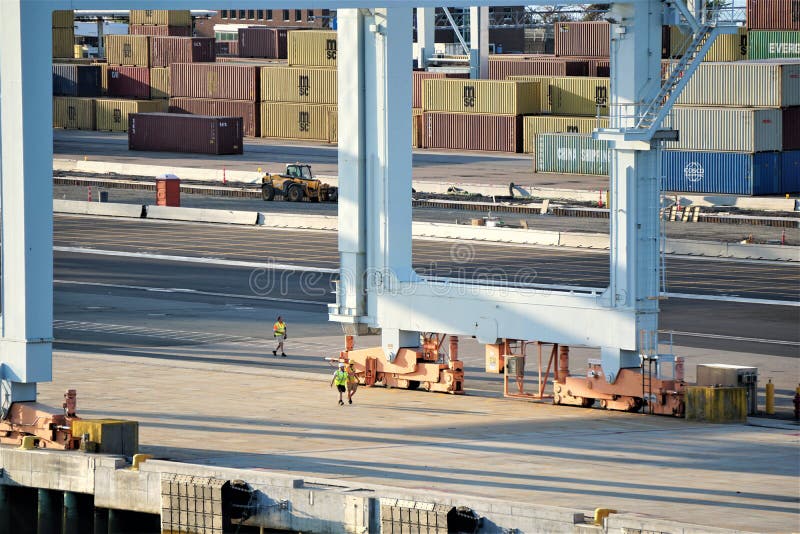 Dock Workers Walk Under High Profile Container Crane at Shift Change ...