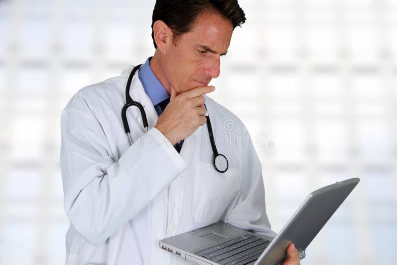Doctor using computer stock image. Image of professional - 17168167