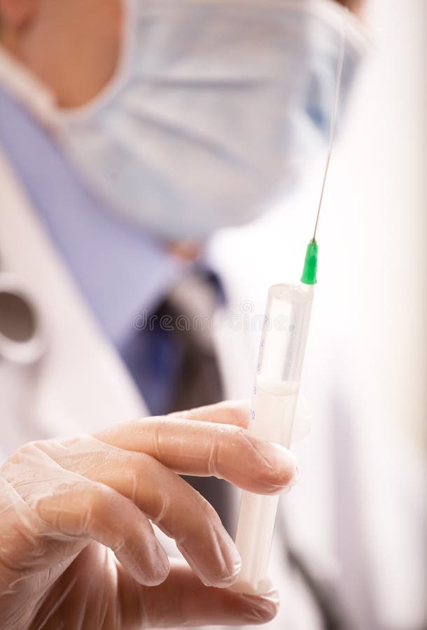 Doctor needle injection stock image. Image of injection - 5791139