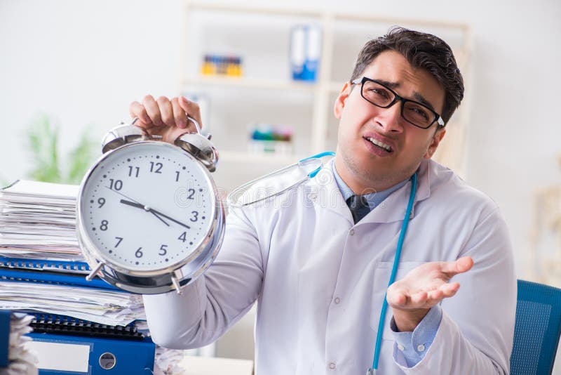 The Doctor with Alarm Clock in Urgent Check-up Concept Stock Image ...