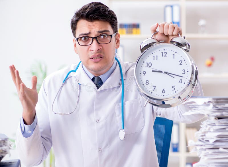 Doctor with Alarm Clock in Urgent Check-up Concept Stock Photo - Image ...