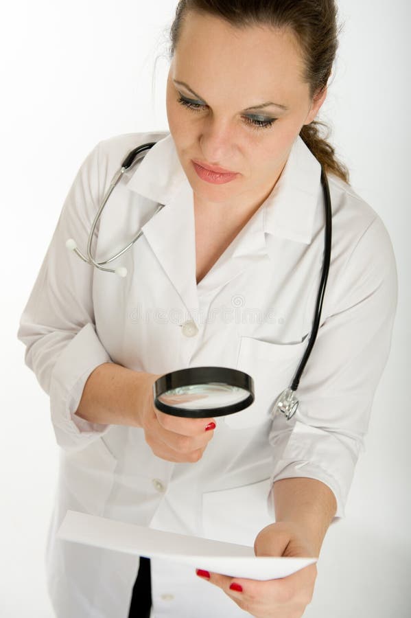 Doctor Analyzing Lab Report Stock Photo - Image of document, serious ...