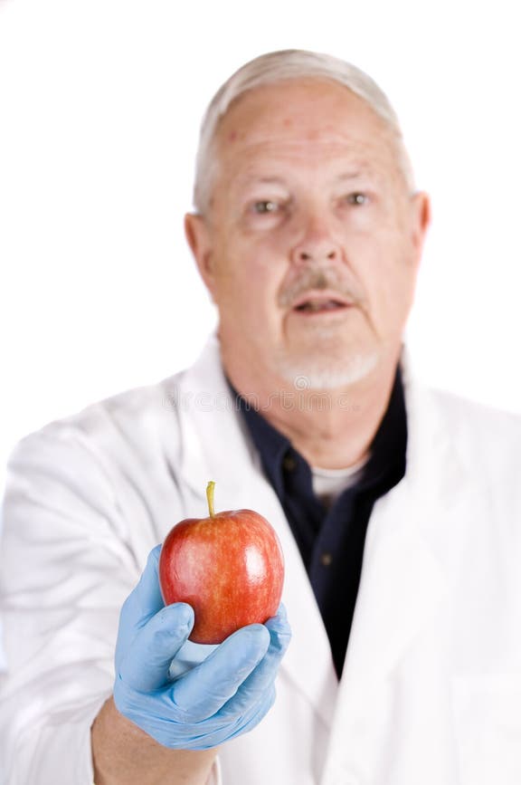 Doctor with apple stock image. Image of white, suggestion - 15176399