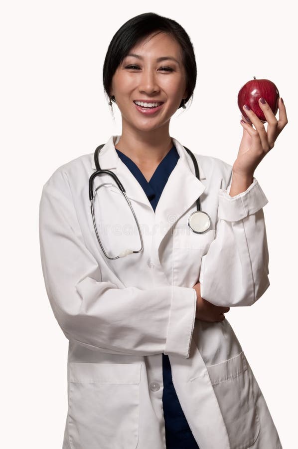 Doctor with apple stock image. Image of brunette, doctor - 9252893