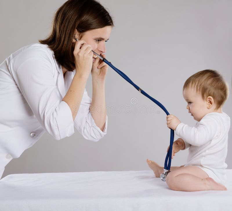 Doctor and baby stock photo. Image of doctor, childhood - 30323278