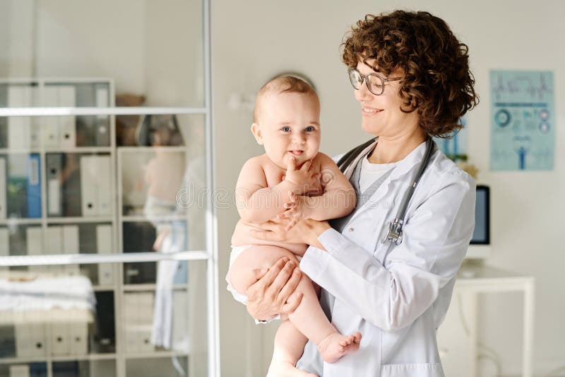 Doctor with Baby at Hospital Stock Photo - Image of smile, baby: 294397782