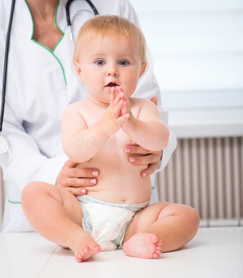 Doctor Giving Baby Girl Checkup in Doctor Office Stock Image - Image of ...
