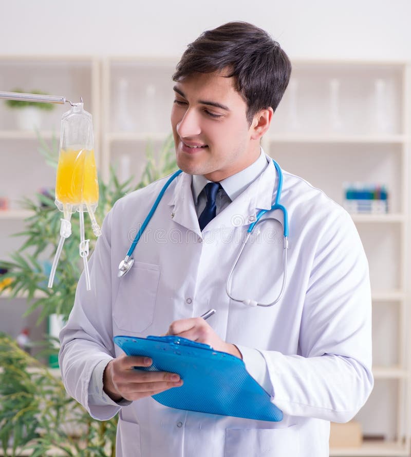Doctor with Bag of Blood Plasma in Hospital Stock Image - Image of ...