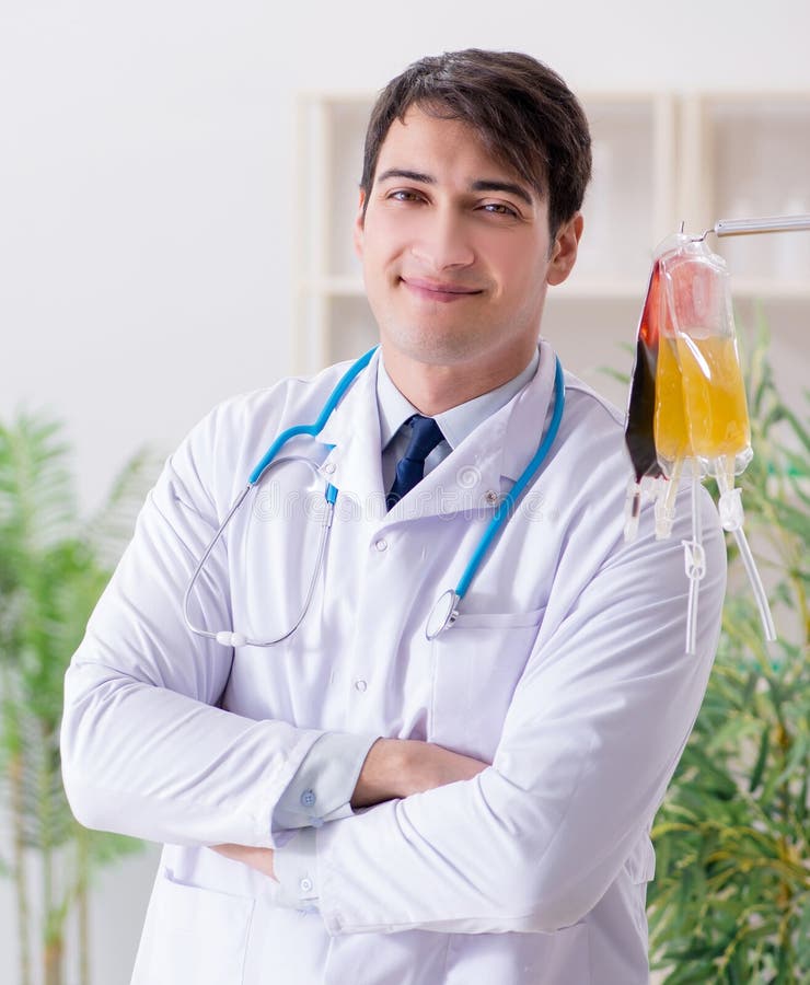 Doctor with Bag of Blood Plasma in Hospital Stock Image - Image of ...