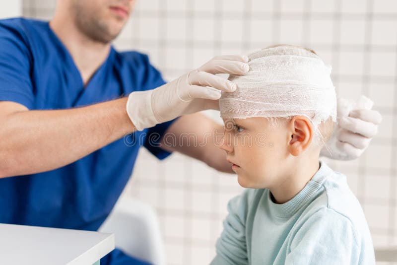 Doctor Bandaged a Boy Head with Trauma in His Head and Elastic Bandaged ...