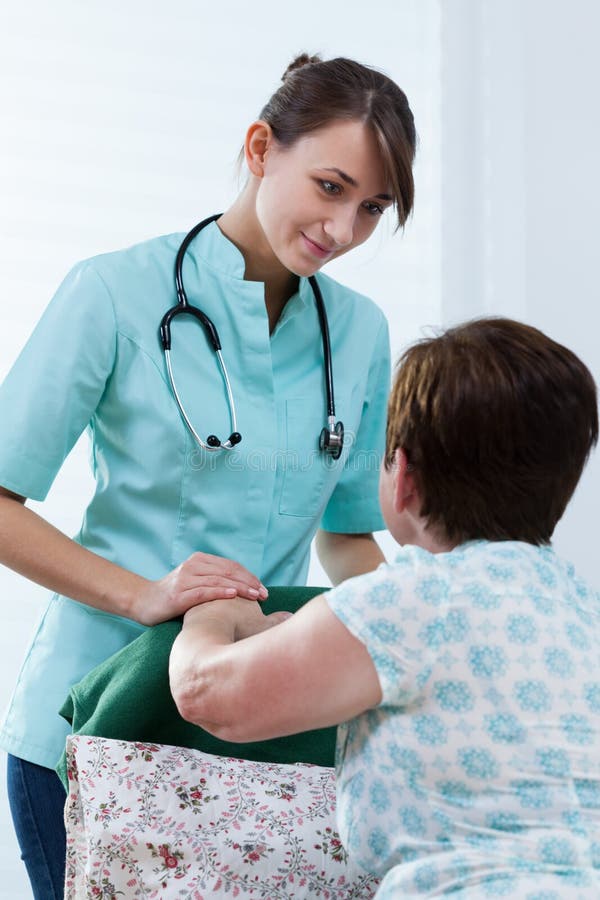 Doctor being on home visit stock image. Image of call - 50764067
