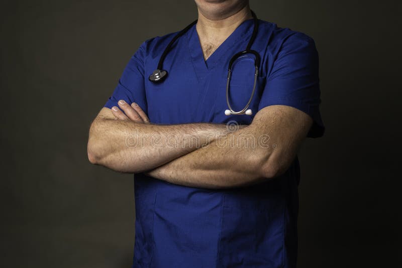 Doctor with Blue Clothing in a Hospital Stock Image - Image of doctor ...