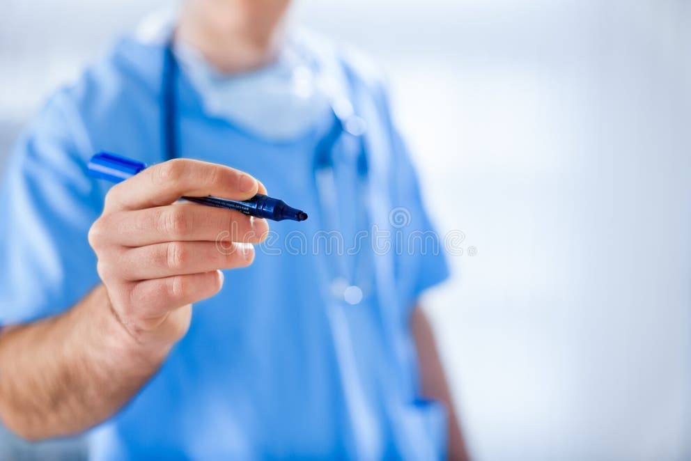 Doctor with blue marker stock photo. Image of holding - 69710652