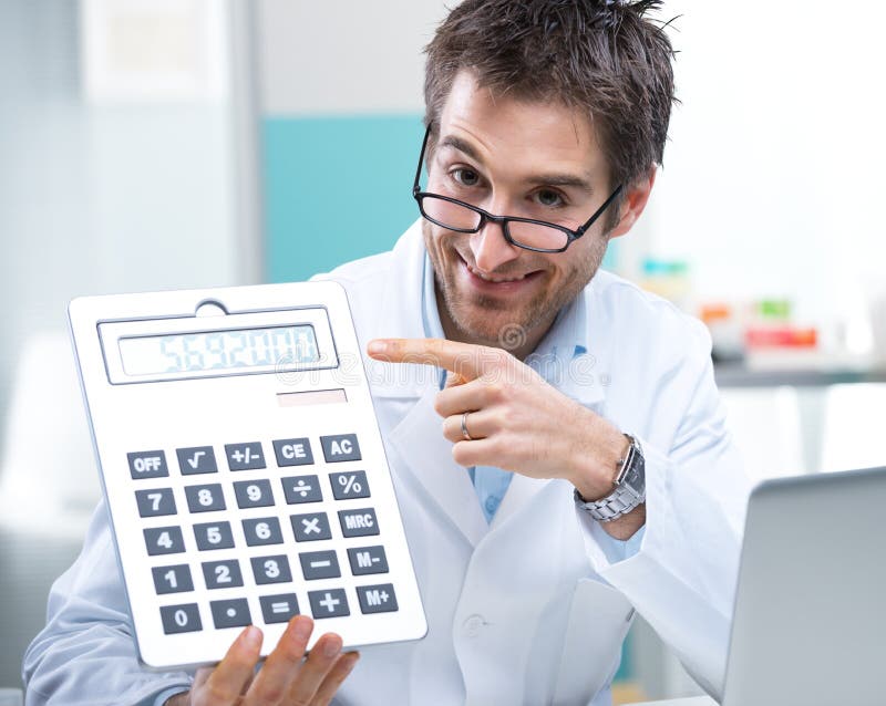 Doctor with calculator stock photo. Image of supplementary - 21841712