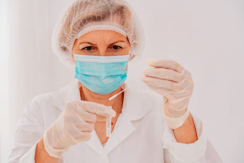Doctor is Checking the Covid-19 Virus with a Tester Stock Photo - Image ...