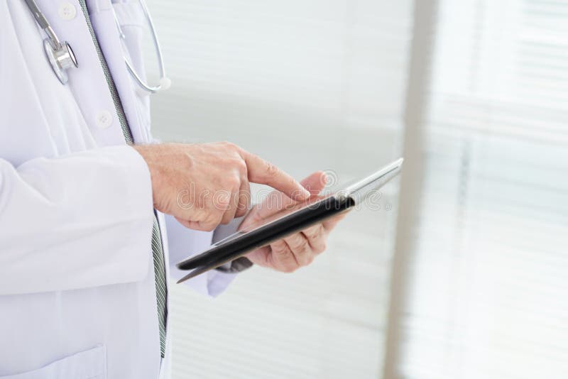 Doctor Checking Data on Digital Tablet Stock Photo - Image of hands ...