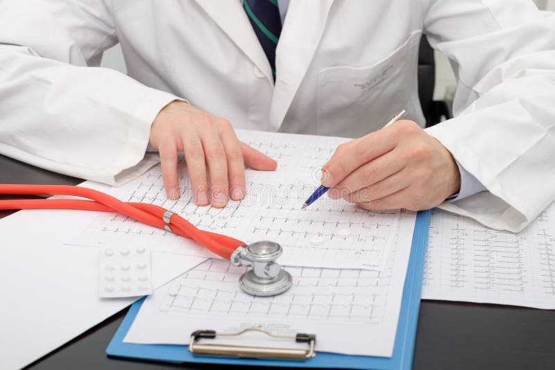 Doctor Checking an Ecg Paper Stock Image - Image of disease, instrument ...