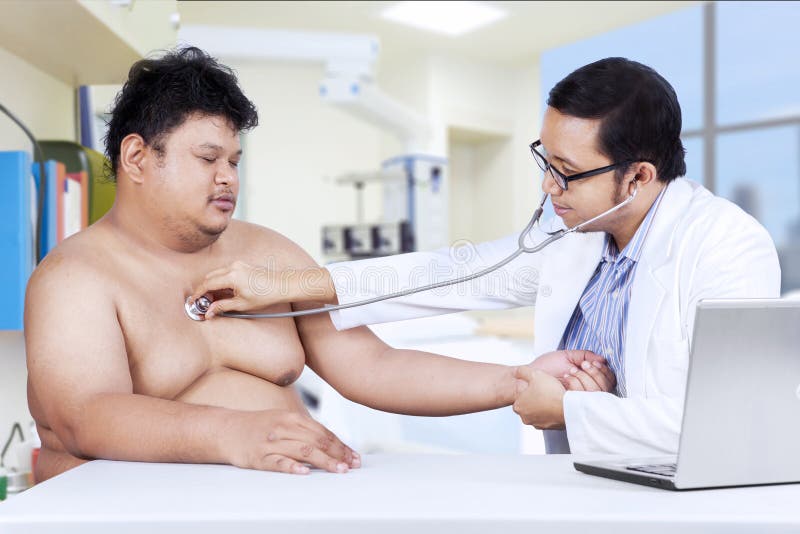 Doctor is Checking a Fat Man Stock Photo - Image of illness, listening ...