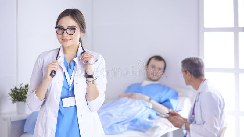 Doctor Checking Heart Beat of Patient in Bed with Stethoscope Stock ...