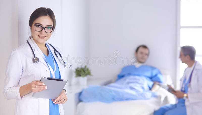 Doctor Checking Heart Beat of Patient in Bed with Stethoscope Stock ...