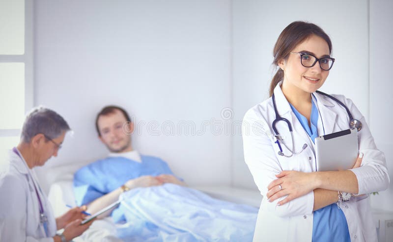 Doctor Checking Heart Beat of Patient in Bed with Stethoscope Stock ...