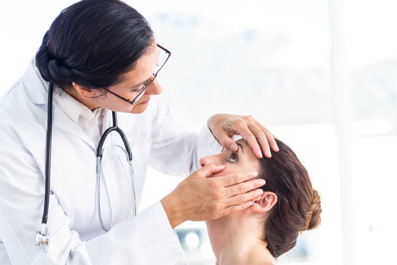 Doctor Checking Her Patients Eyes Stock Image - Image of specialist ...