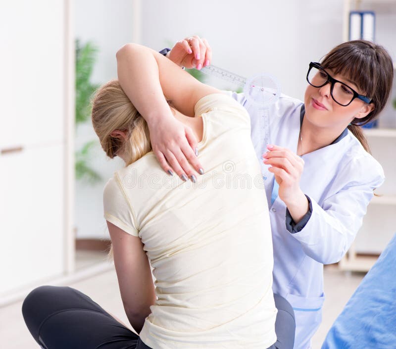 Doctor Checking Joint Flexibility With Goniometer Stock Image - Image ...