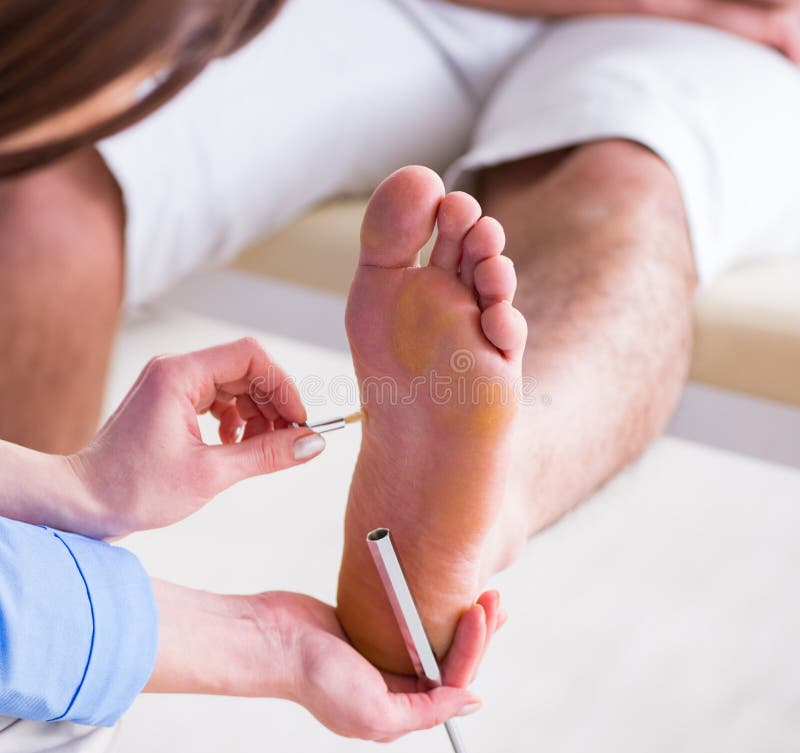 Doctor Checking Nerve Reflexes with Hammer Stock Image - Image of ...