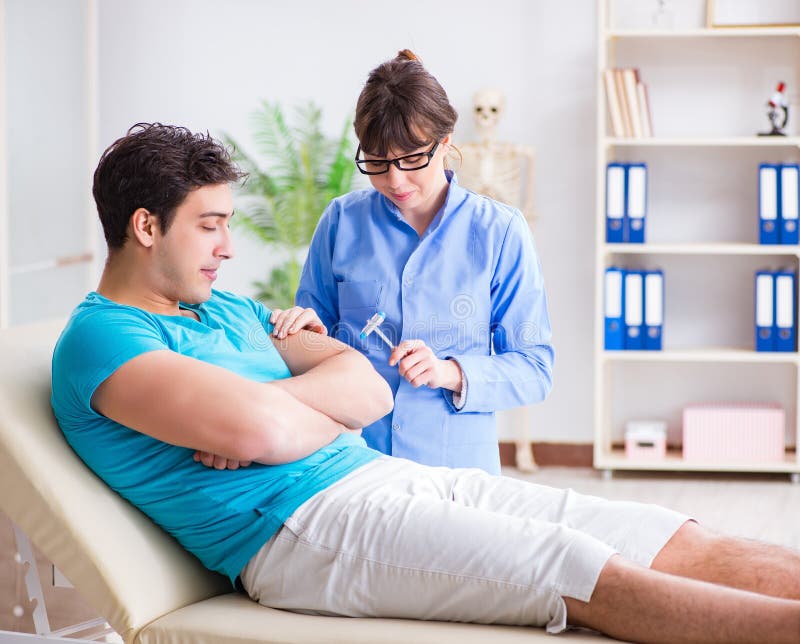 Doctor Checking Nerve Reflexes with Hammer Stock Photo - Image of ...