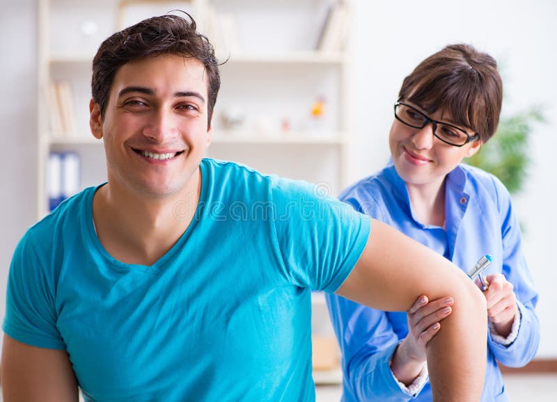 Doctor Checking Nerve Reflexes with Hammer Stock Photo - Image of ...