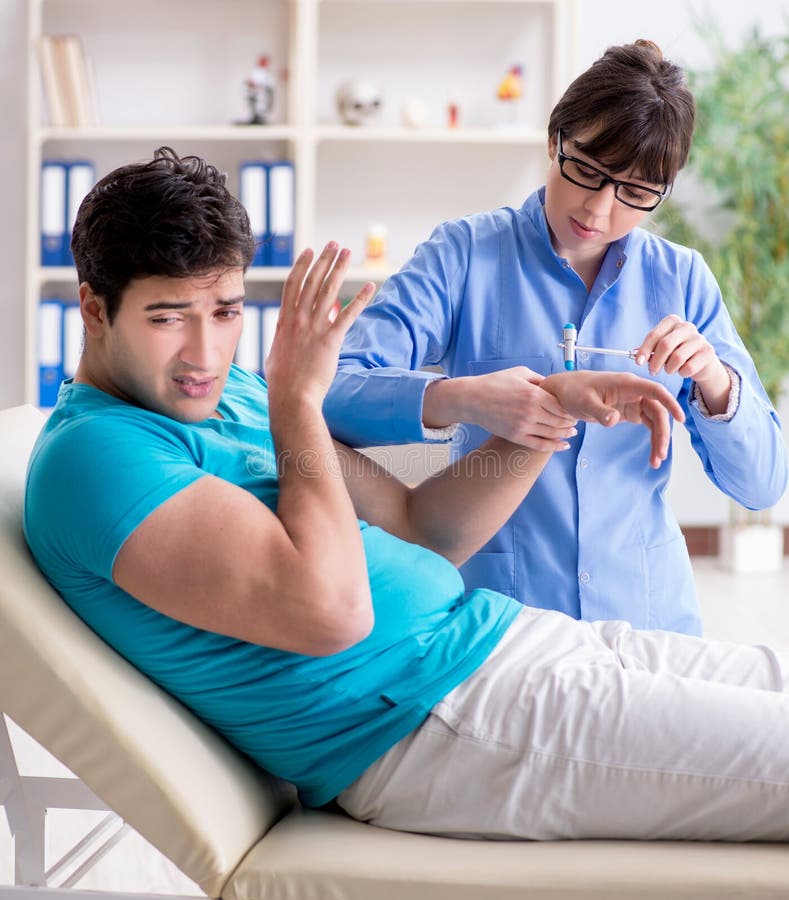 Doctor Checking Nerve Reflexes with Hammer Stock Photo - Image of ...