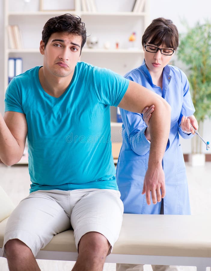 Doctor Checking Nerve Reflexes with Hammer Stock Photo - Image of ...