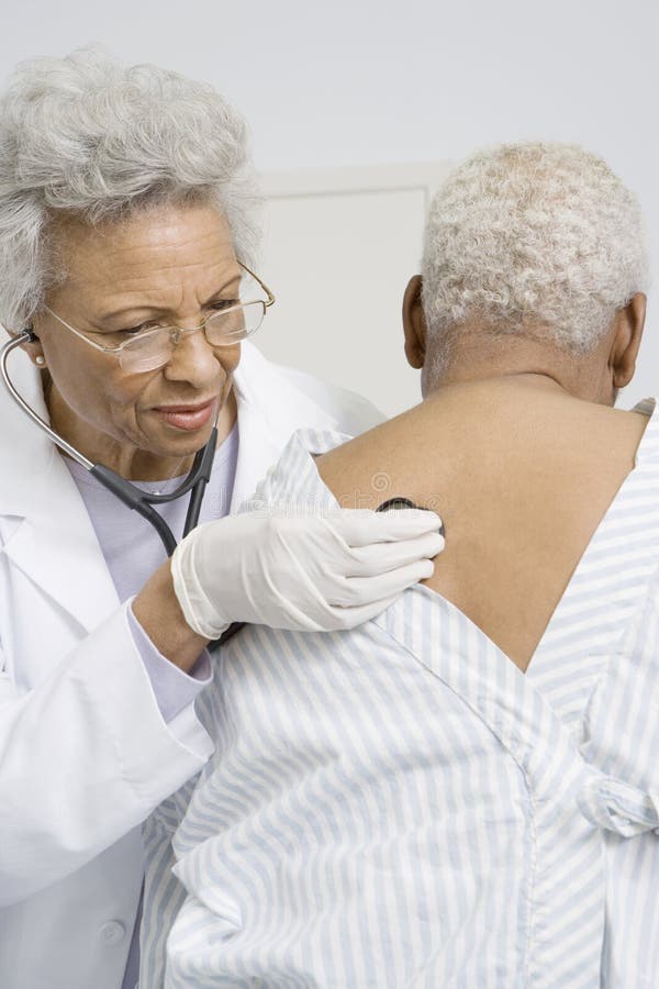 Doctor Checking Patient S Back Using Stethoscope Stock Photo - Image of ...