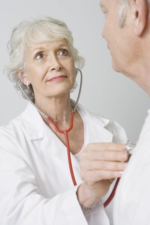 Doctor Checking Patient S Heartbeat Using Stethoscope Stock Photo ...