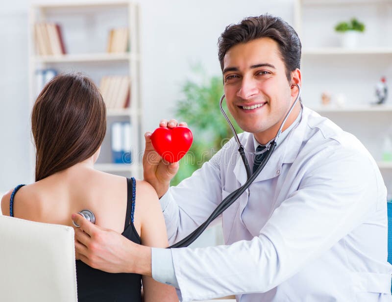 Doctor Checking Patient with Stethoscope Stock Image - Image of clinic ...
