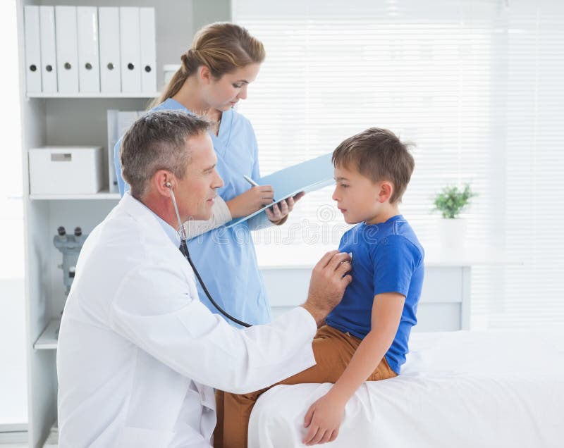 Doctor Checking a Patients Heartbeat Stock Image - Image of doctor ...
